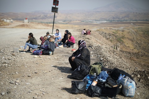 Displaced by war, Kurdish families stuck at Syria-Iraq border point ...