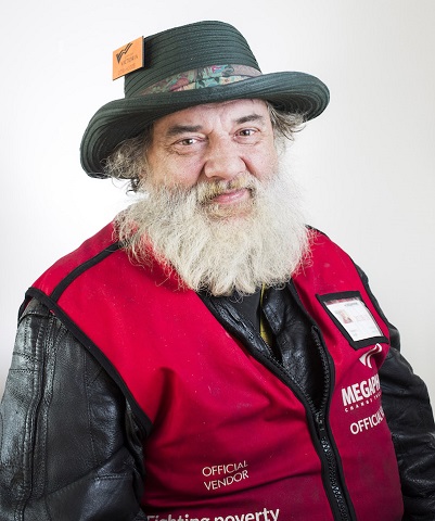 Megaphone vendor Delisle Doucet says to customers: “Hope to see you ...